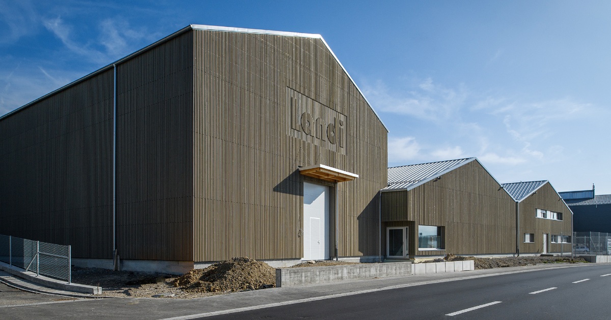 Wooden façade for Landi branch in Gossau by Blumer Lehmann